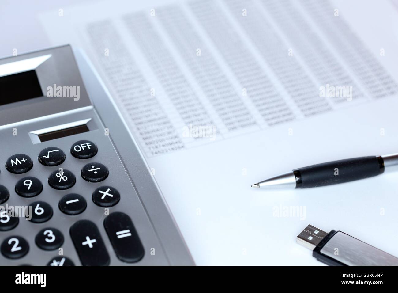 data- disk with calculator and numbers on a workplace Stock Photo - Alamy