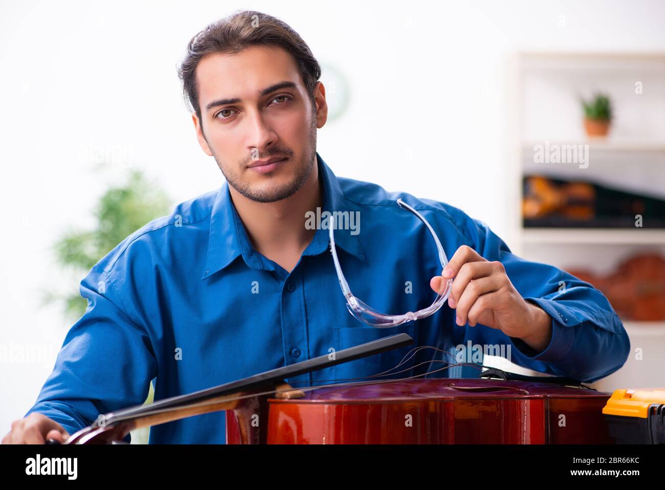 Cello repair hi-res stock photography and images - Alamy