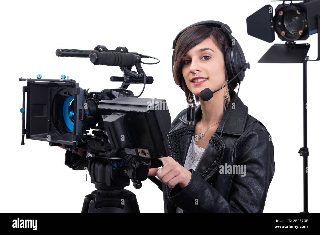 young woman with professional video camera, dslr, isolated on white ...
