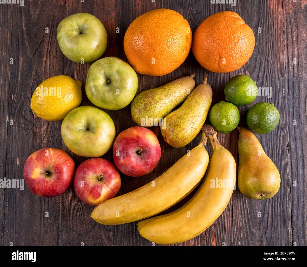Flat lay a set of fresh fruits on wooden table Stock Photo - Alamy
