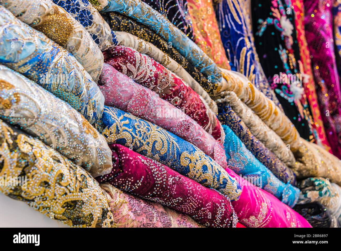 Traditional oriental cloth sold in a store in old town Dubai, United ...