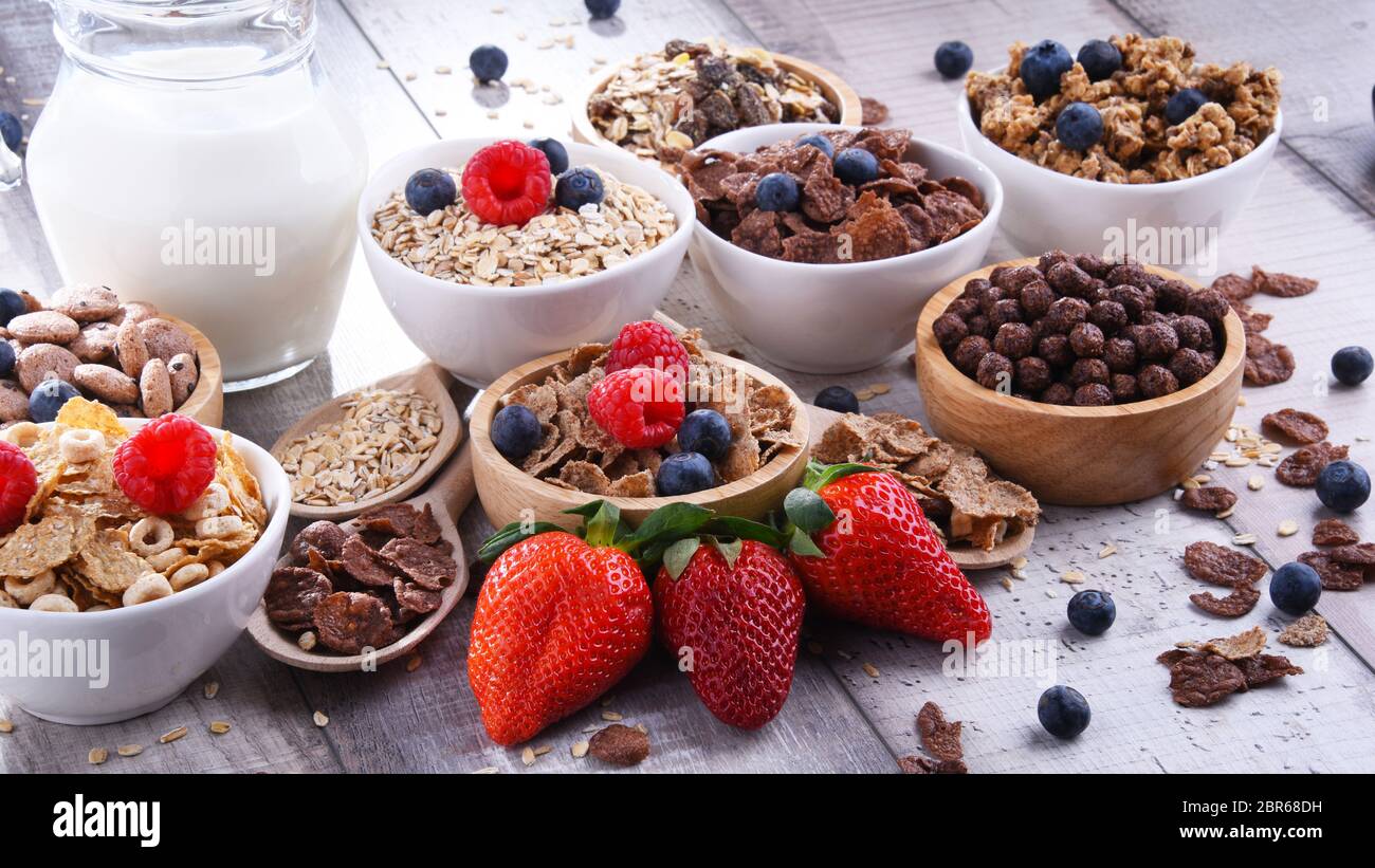 Bowls containing different sorts of breakfast cereal products Stock ...