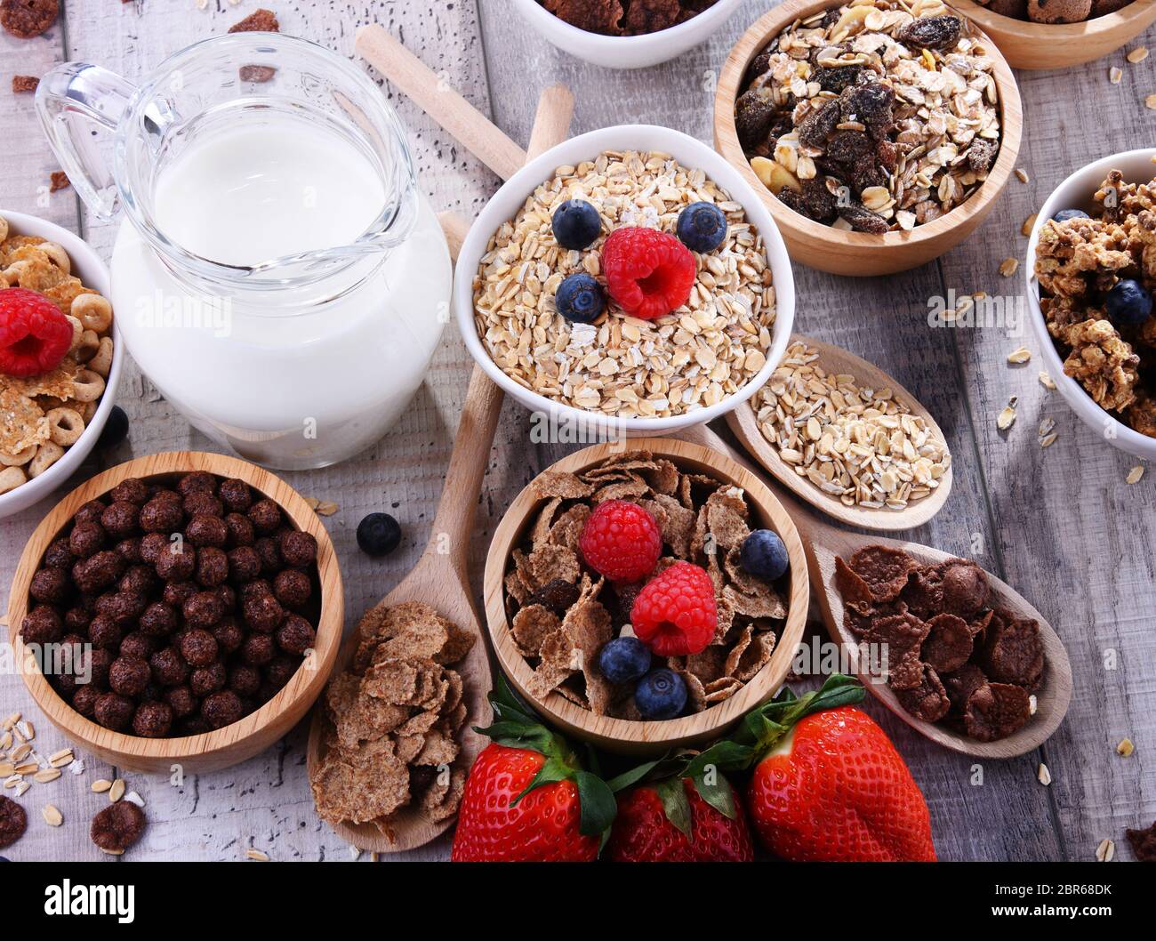 Bowls containing different sorts of breakfast cereal products Stock ...