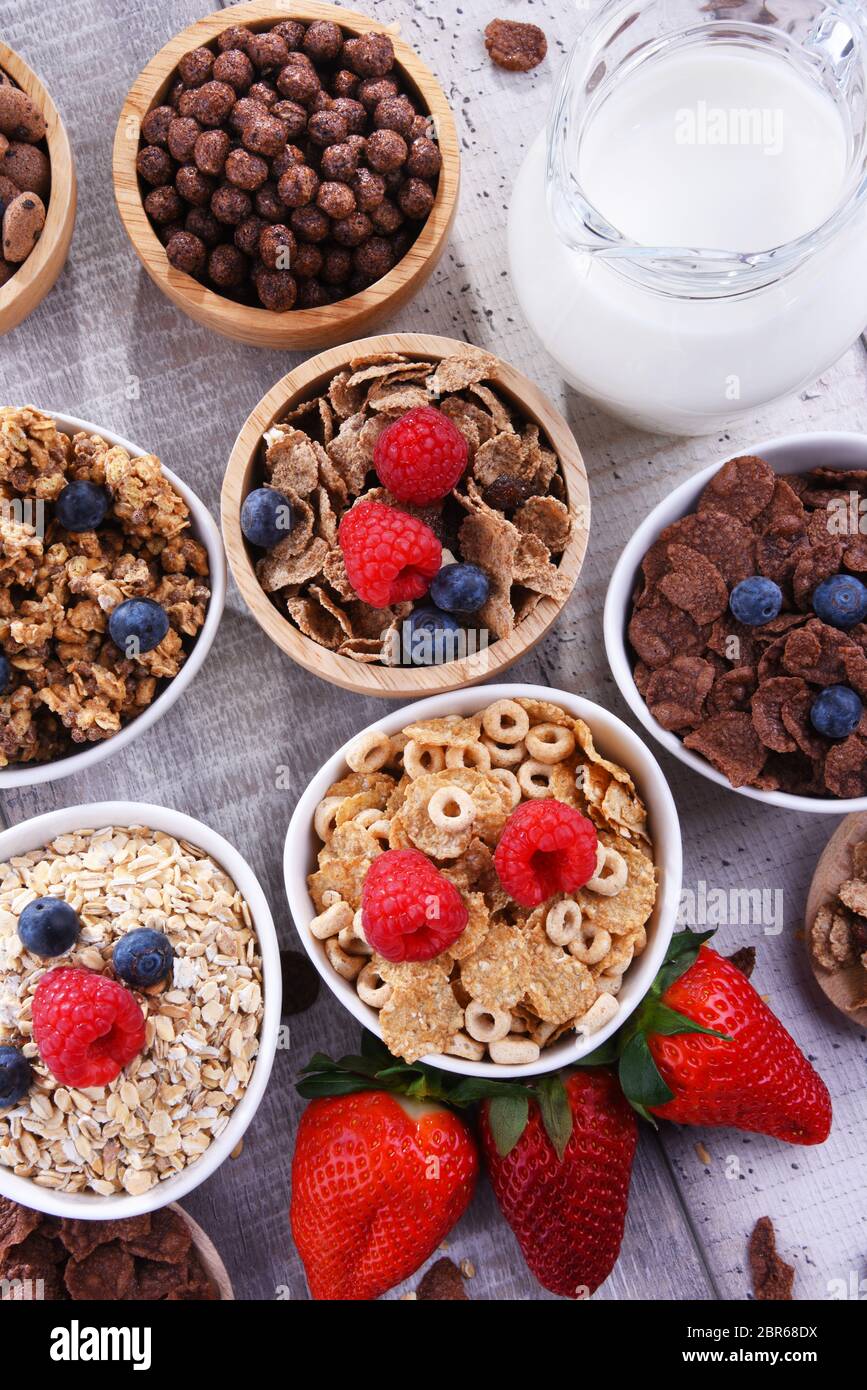 Bowls containing different sorts of breakfast cereal products Stock ...