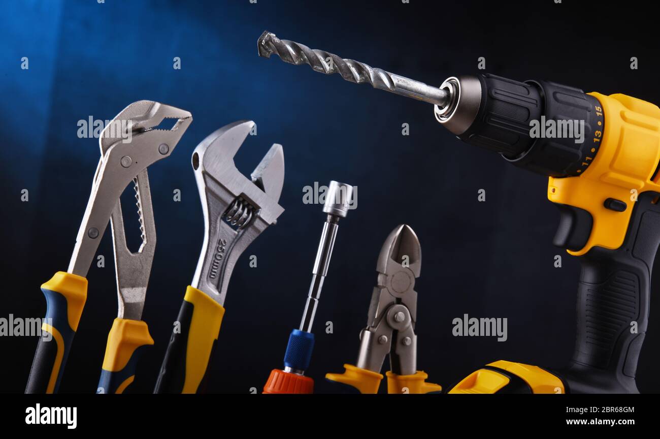 Composition with different kinds of hardware tools including cordless ...