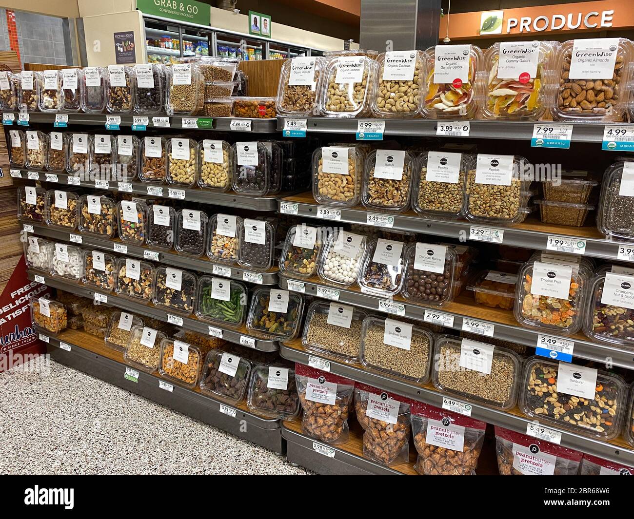 Orlando, FL/USA-5/4/20: A display of snacks in plastic containers at a ...
