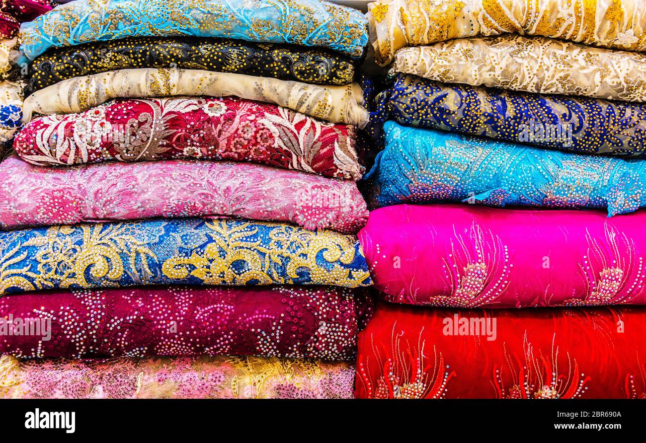 Traditional oriental cloth sold in a store in old town Dubai, United ...