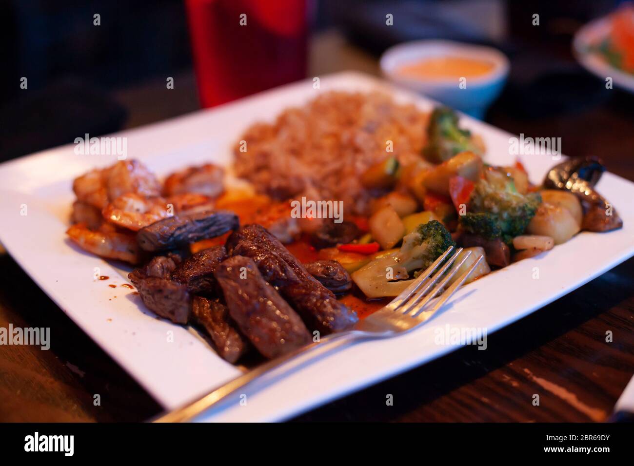 Shrimp, steak, rice and vegetables ready to serve Stock Photo - Alamy