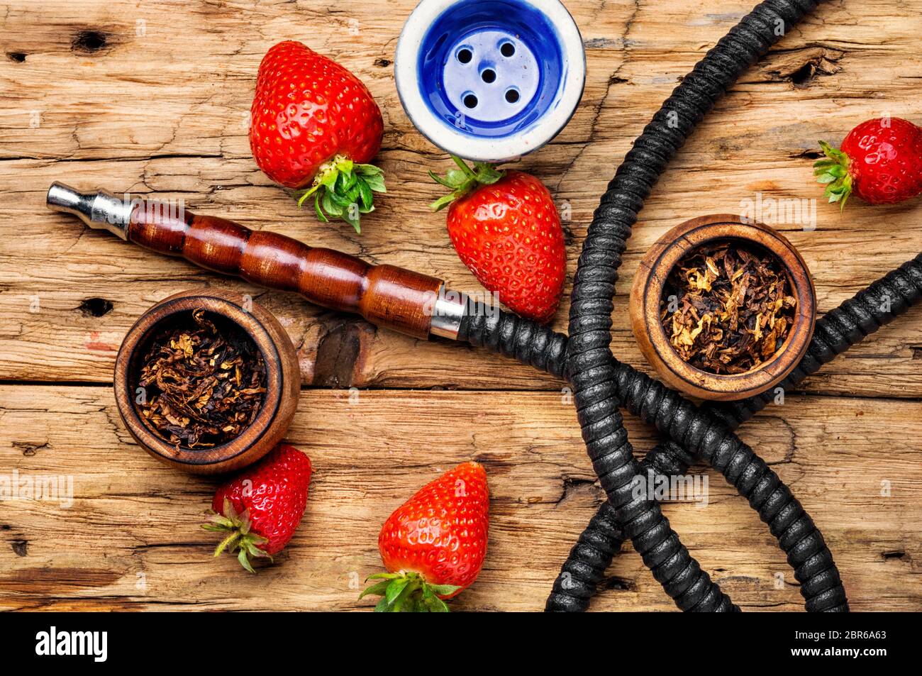 Oriental hookah with strawberry flavor.Turkish shisha with berry ...