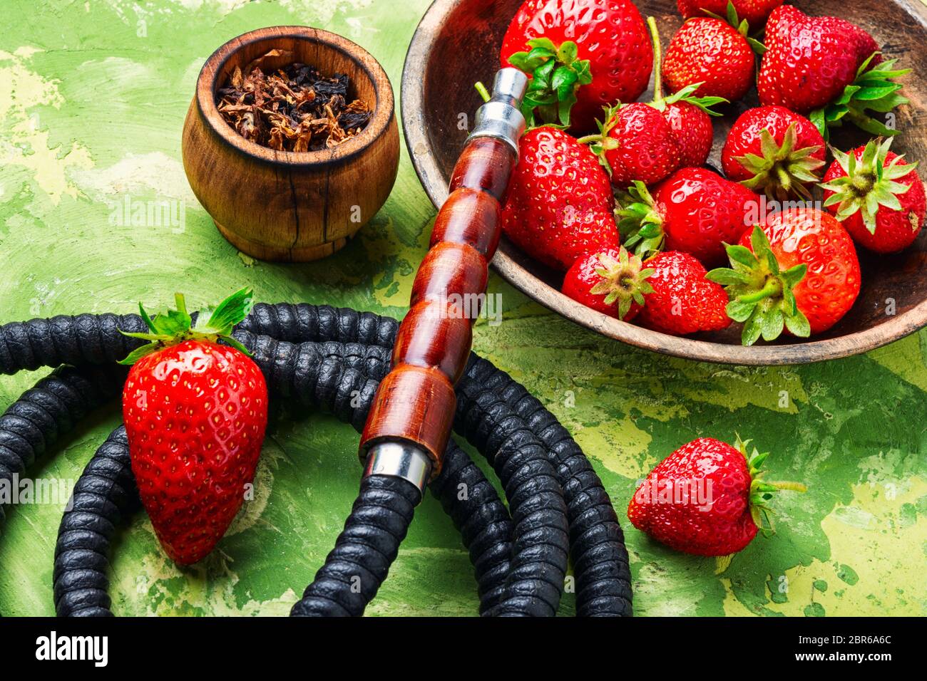Oriental hookah with strawberry flavor.Turkish shisha with berry ...