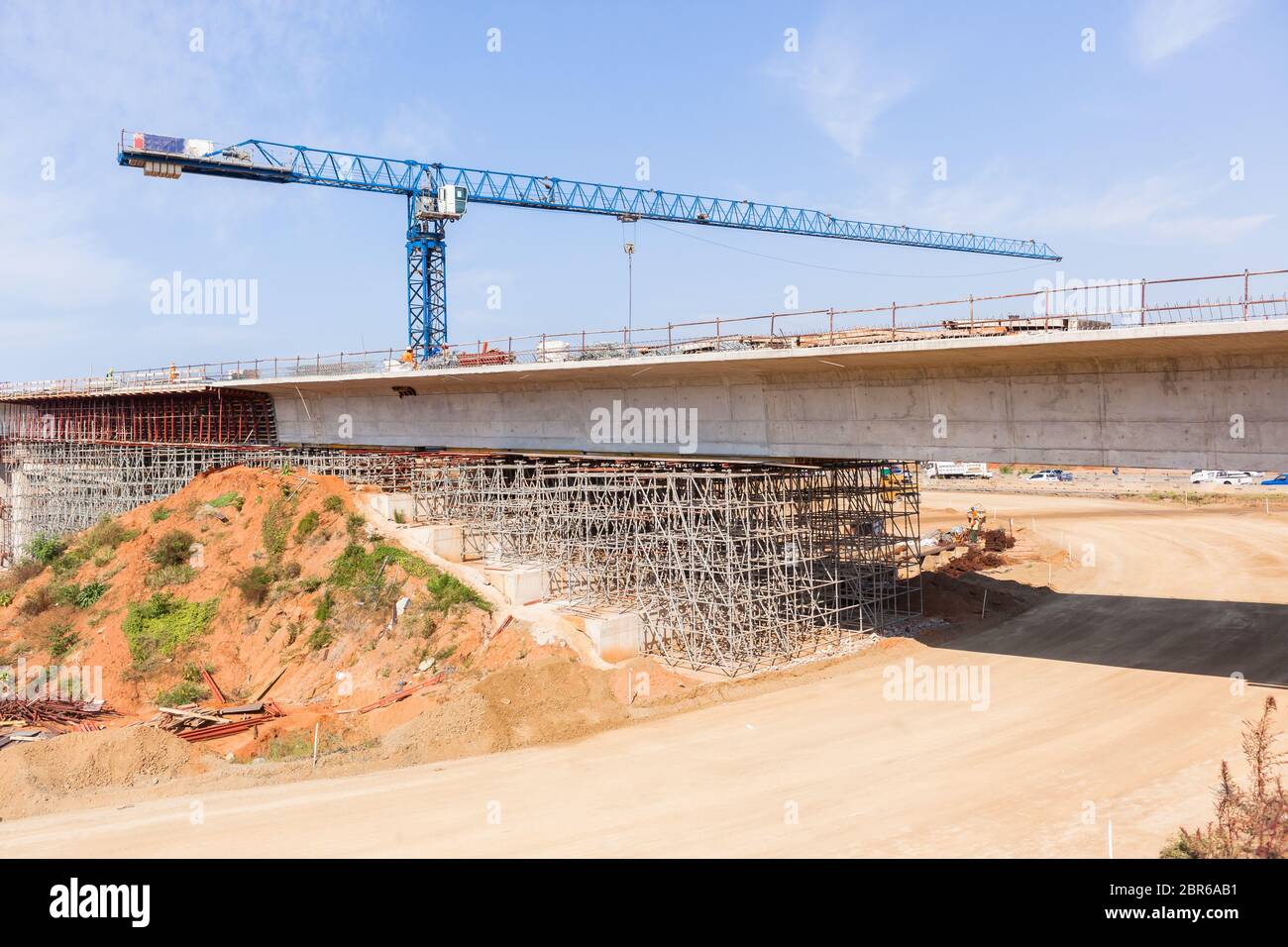 Construction Industrial crane on new road highway ramp site Stock Photo ...