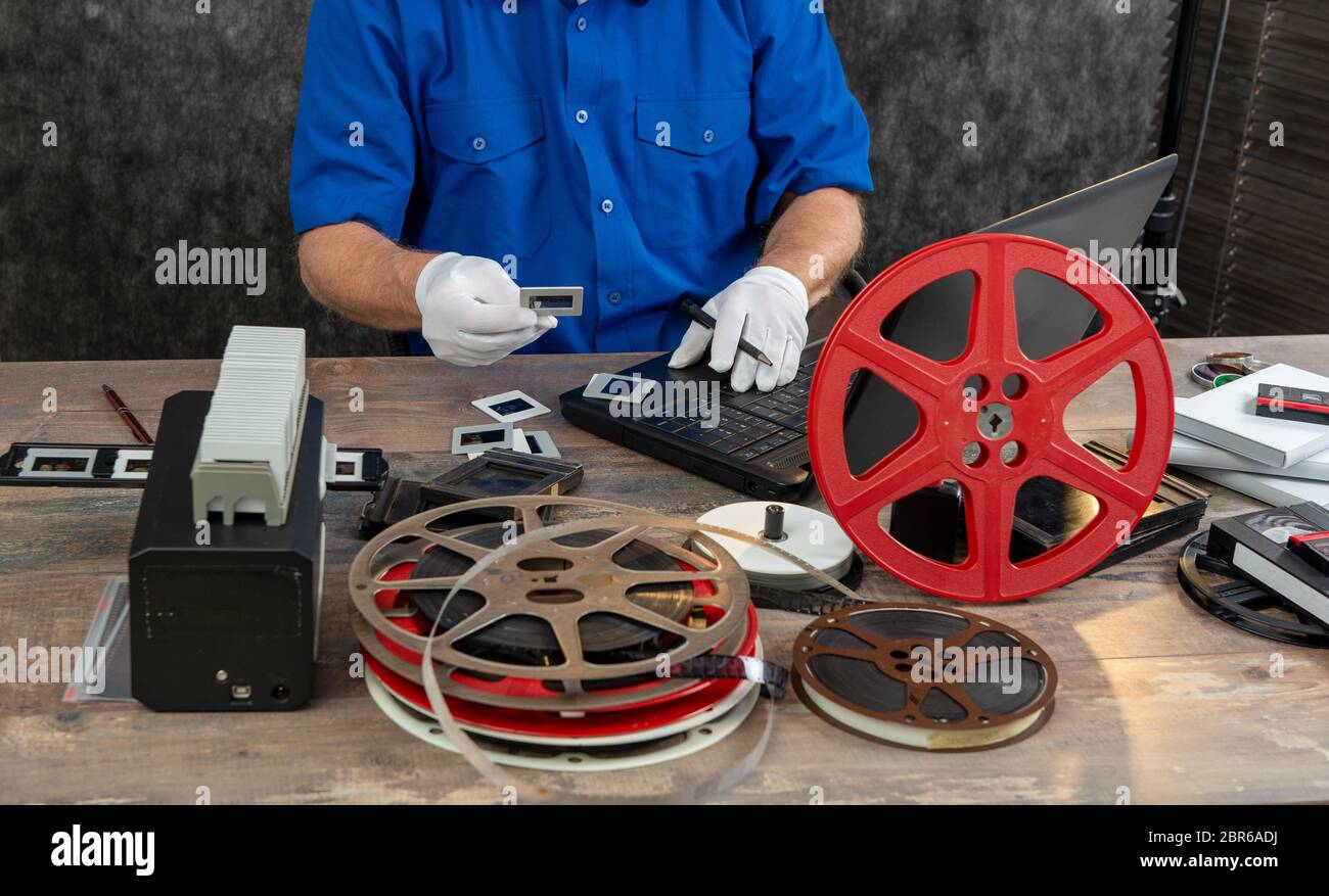 hand photographer digitize a film slide 35mm for saving Stock Photo - Alamy
