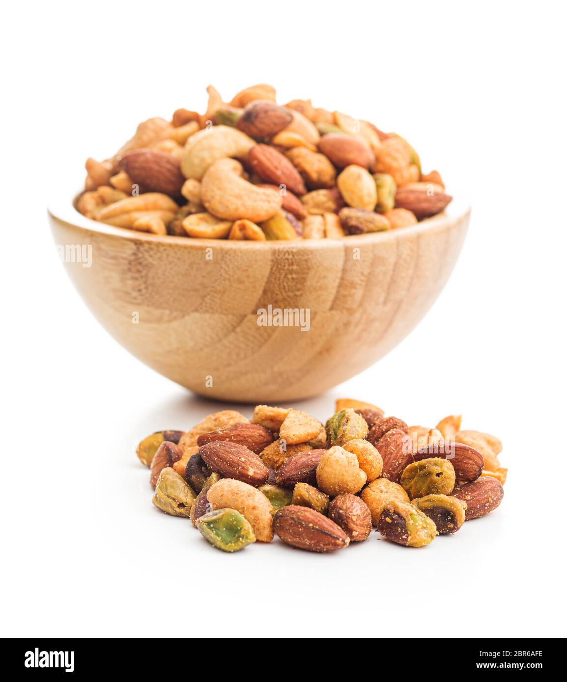Spicy flavoured nuts. Mix of nuts isolated on white background Stock ...