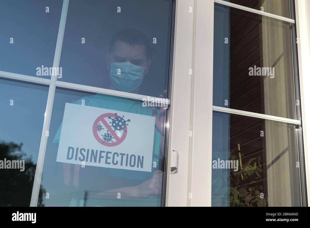 DISINFECTION sign on a door shop or restourant Stock Photo - Alamy