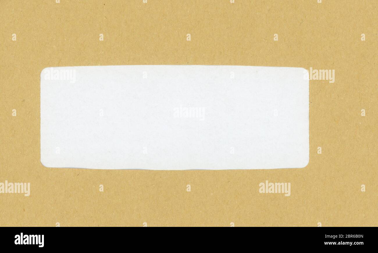 brown paper letter envelope with blank white label for mail postage ...