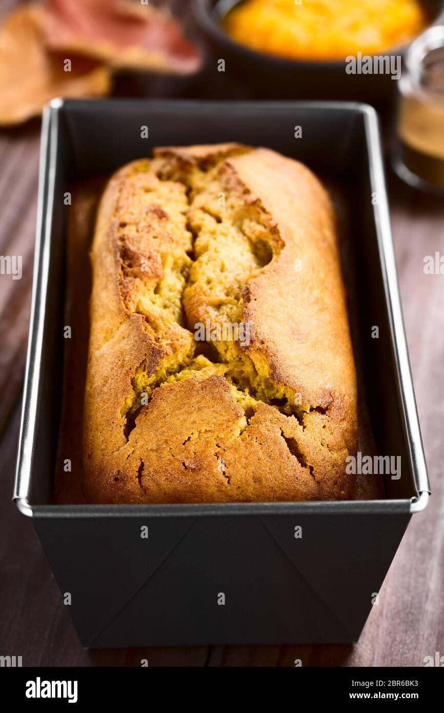 Fresh homemade pumpkin bread in pan (Selective Focus, Focus one third ...