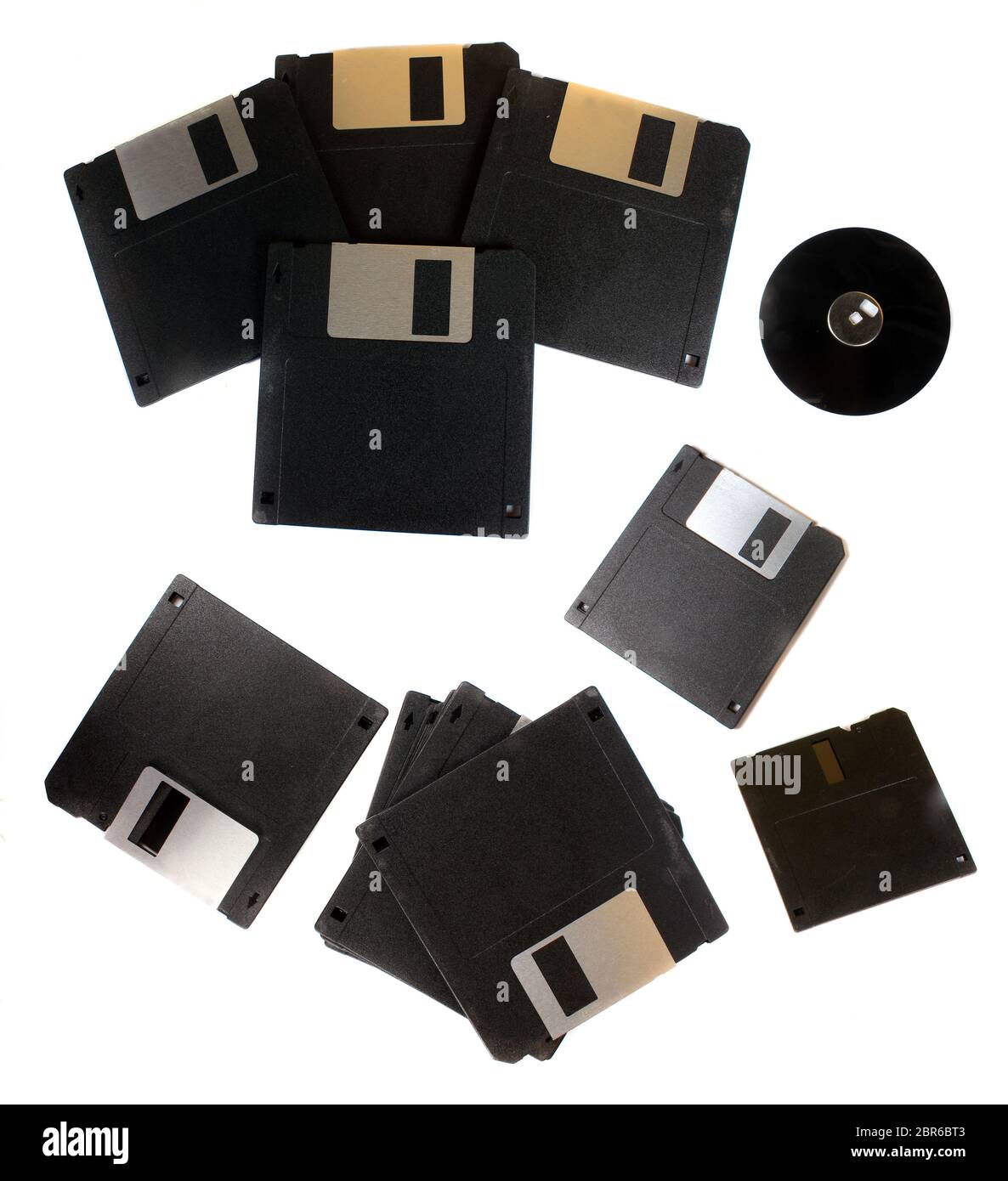 Old floppys used for computer storage in 80s and 90s, on white studio ...