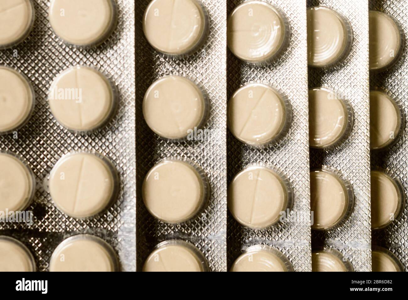 Heap of Capsules packed in blisters, round patterned shaped medicine ...