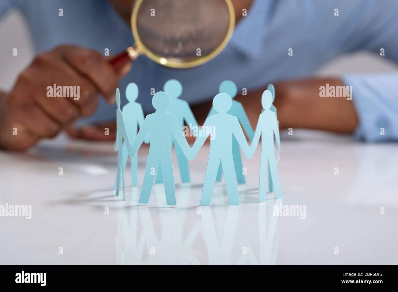 Cutout paper people forming circle hi-res stock photography and images ...