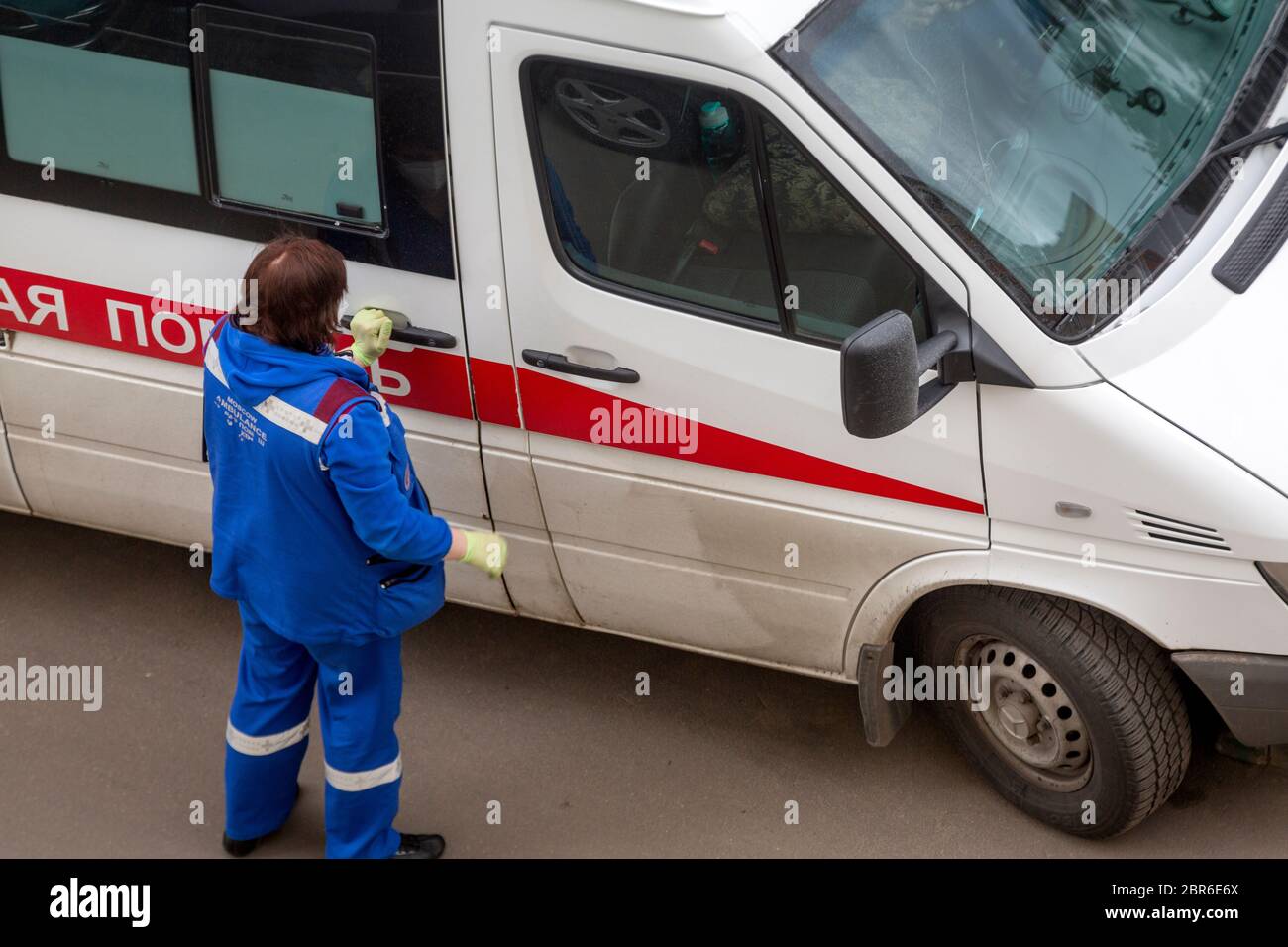 Top view of a car of an emergency ambulance service arrived on a call ...