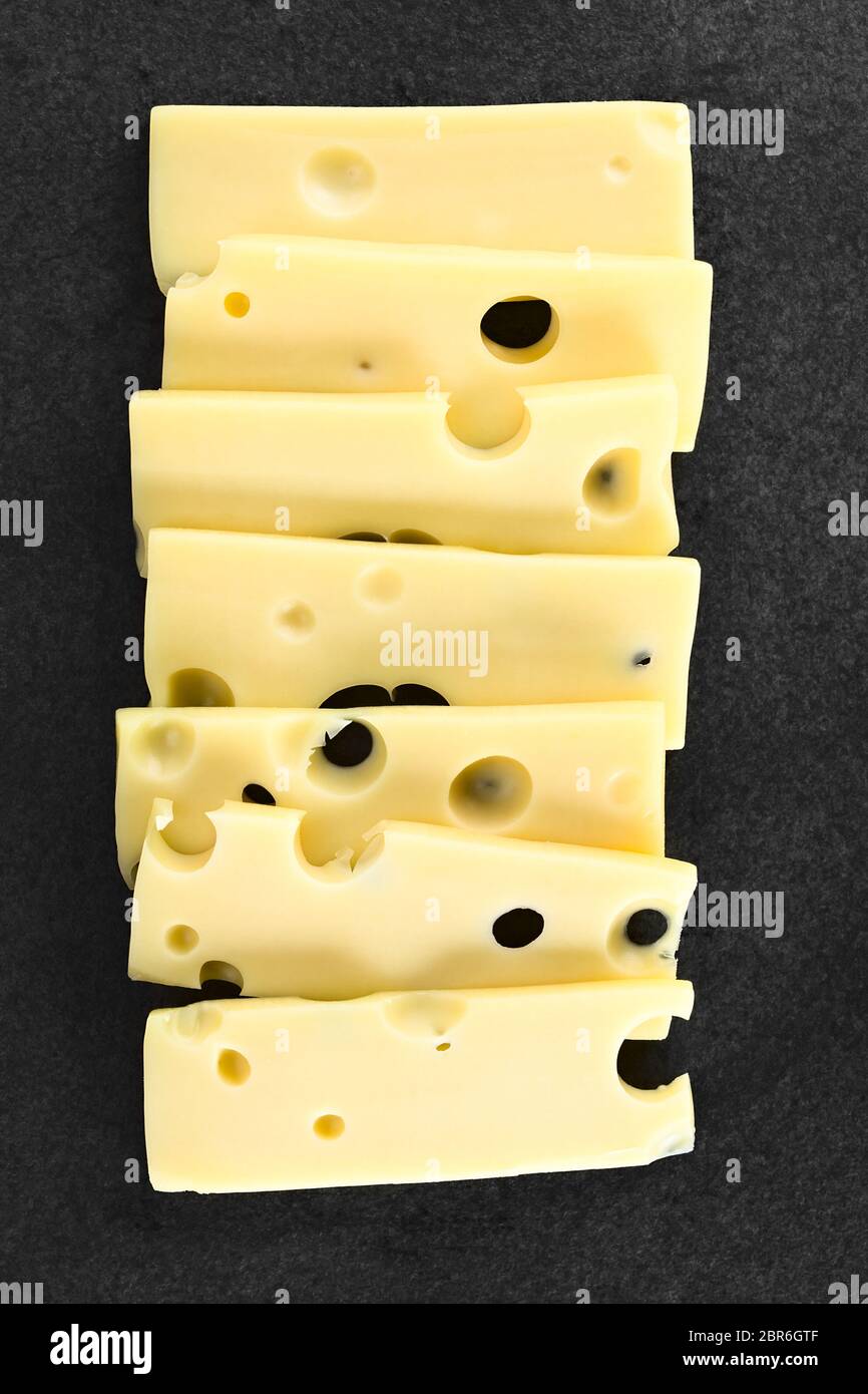 Slices of Emmental, Emmentaler or Emmenthal cheese, photographed ...