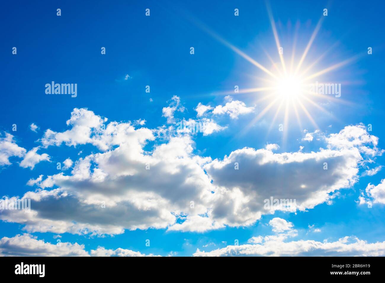 Summer background, wonderful blue sky with bright sun Stock Photo - Alamy
