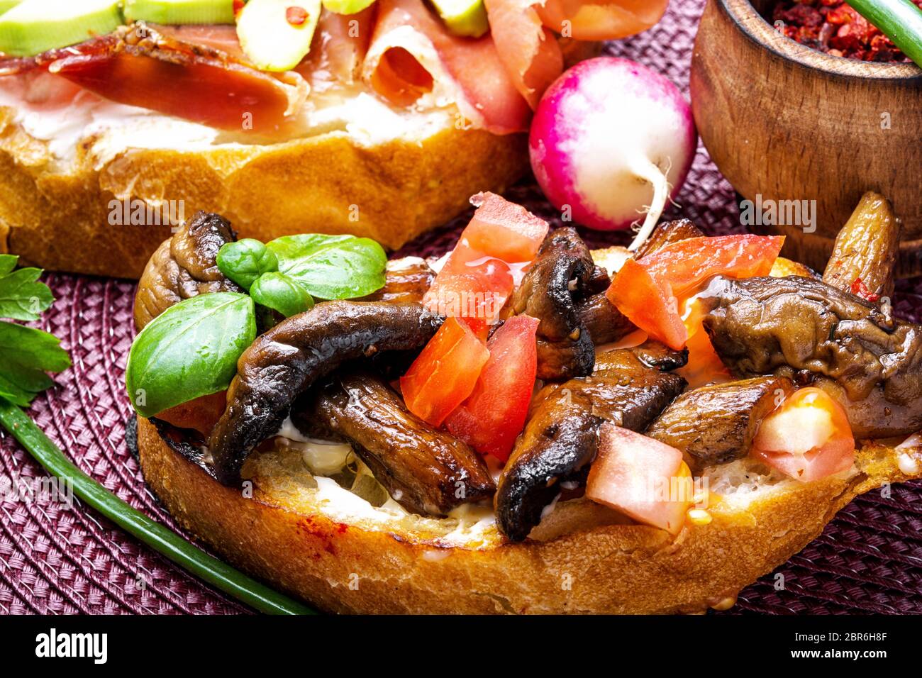 Variety of small sandwiches.Bruschetta is traditional Italian common ...