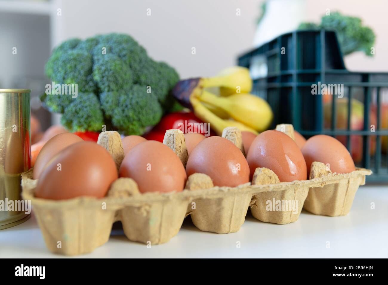 Fresh healthy groceries and vegetables from supermarket in green tray ...