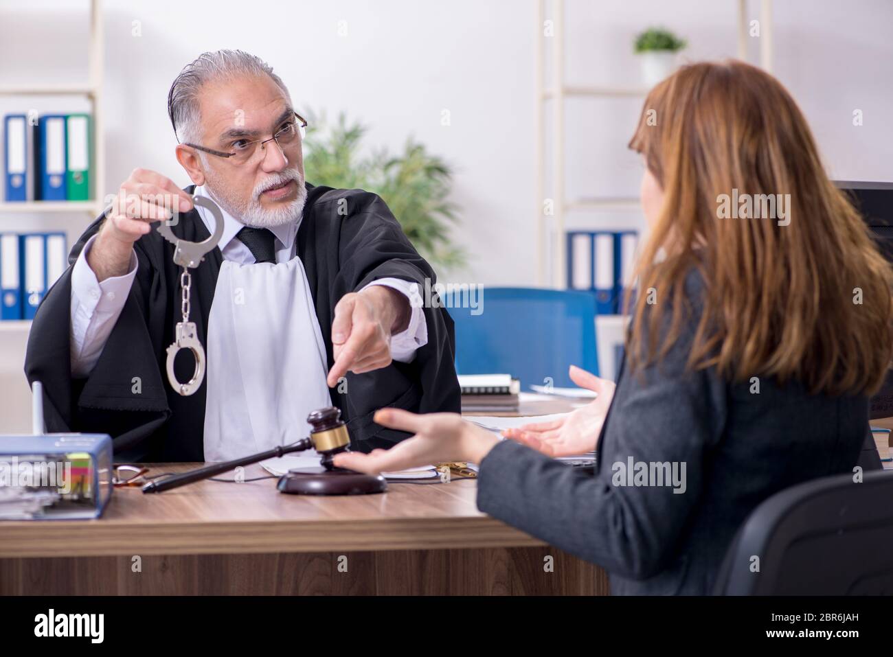 Female judge handcuffs hi-res stock photography and images - Alamy