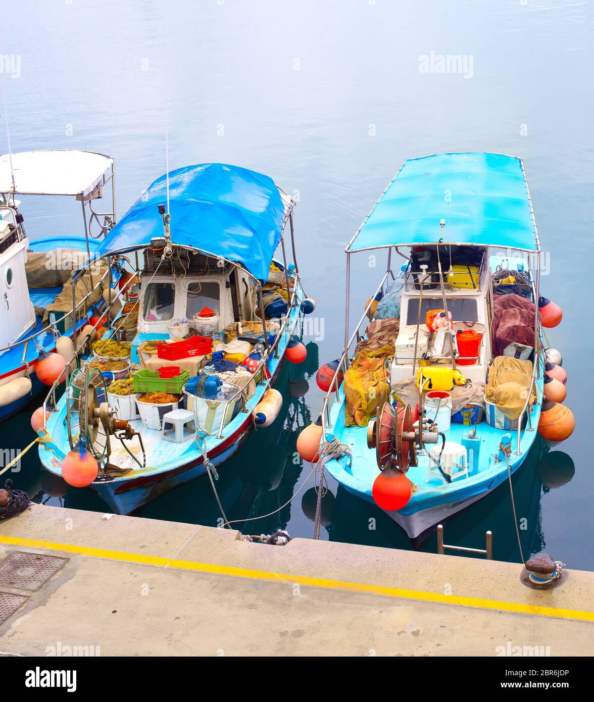 Typical Cyprus fishing boats in Limassol harbor Stock Photo - Alamy