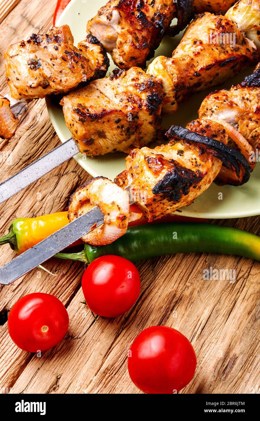 Skewers of pork shish kebab.Barbecue skewers with juicy meat.Summer ...