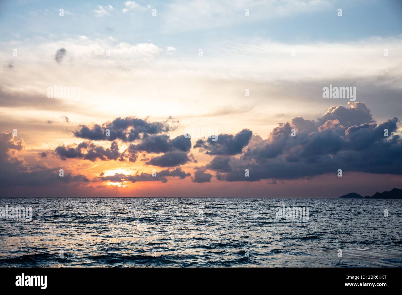 Photo Of Dramatic Sky Over Sea At Sunset Stock Photo - Alamy