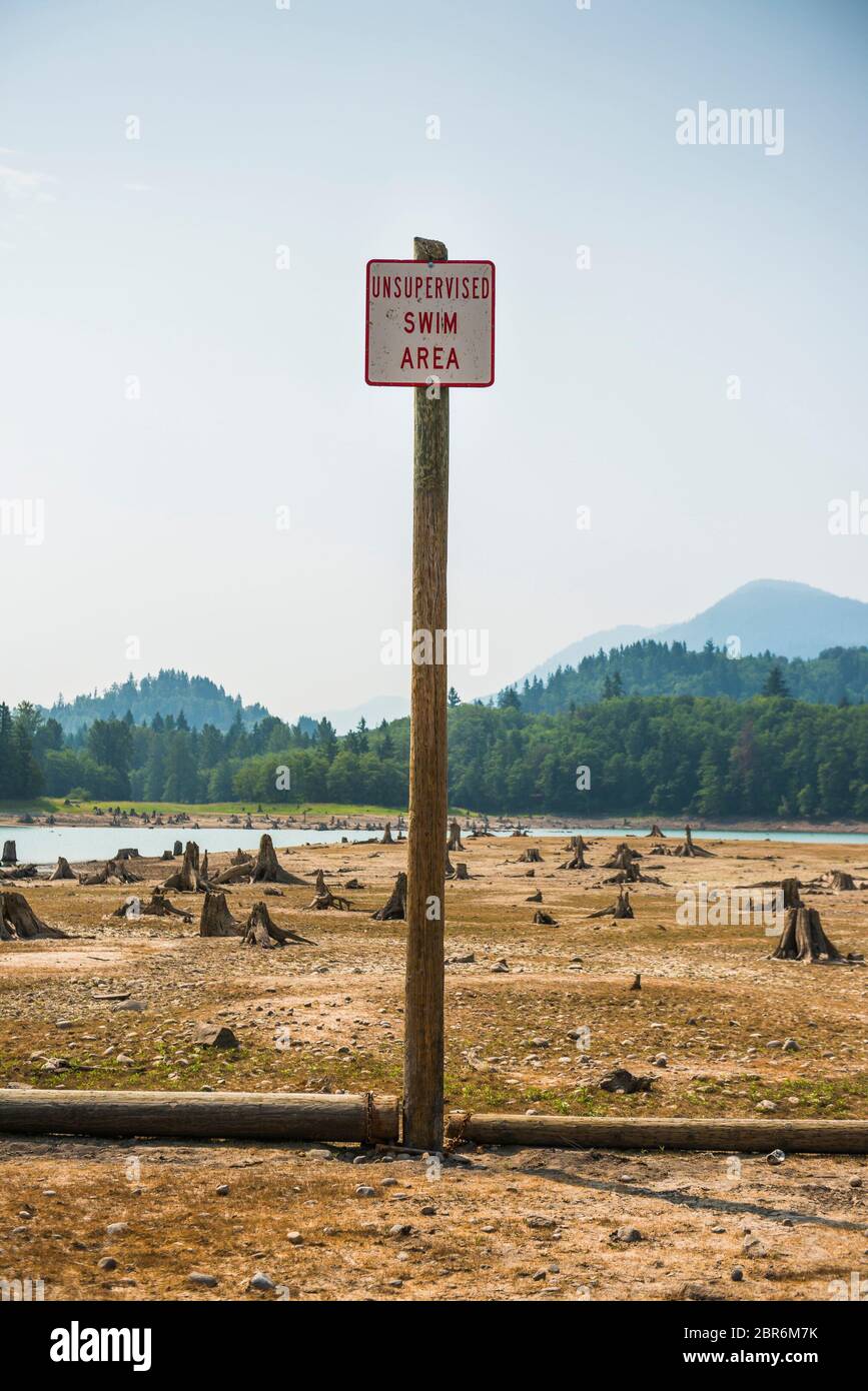 unsupervised swim area sign ,in arid area Stock Photo - Alamy
