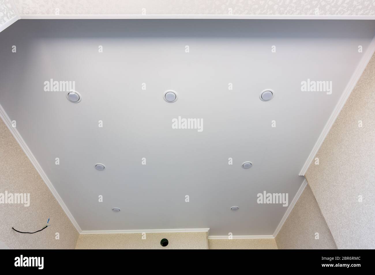 Stretch ceiling in the kitchen with perimeter-mounted spotlights Stock ...
