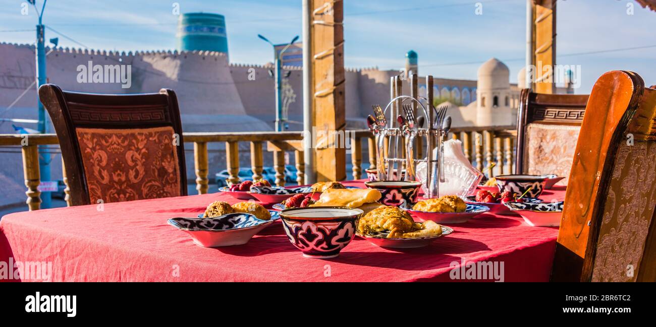 Traditional Uzbek breakfast served on the terrace Stock Photo - Alamy