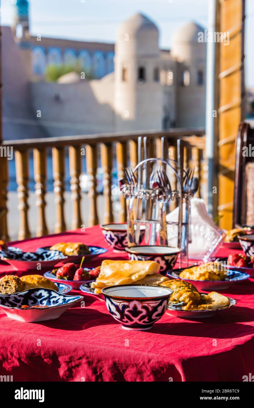 Traditional Uzbek breakfast served on the terrace Stock Photo - Alamy