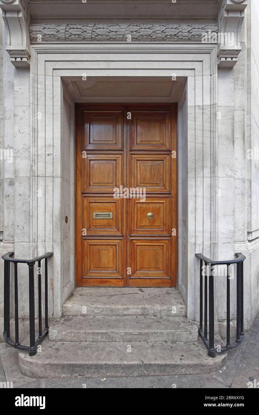 Big Double Wooden Doors at Building Corner Stock Photo - Alamy