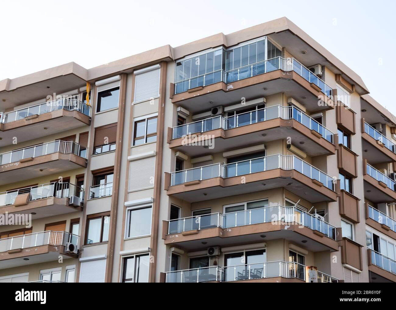 Balconies of a residential high-rise building. Residential buildings in ...