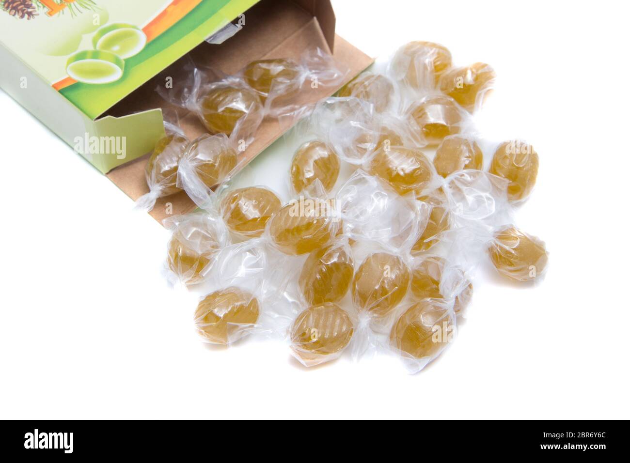 pine syrup medical candies with box on white background Stock Photo - Alamy