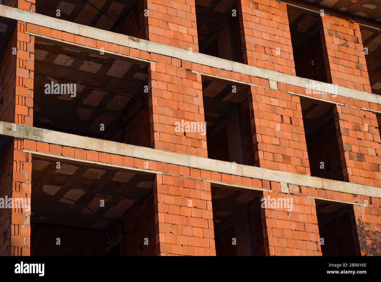Construction of a new house of bricks. High-rise construction Stock ...