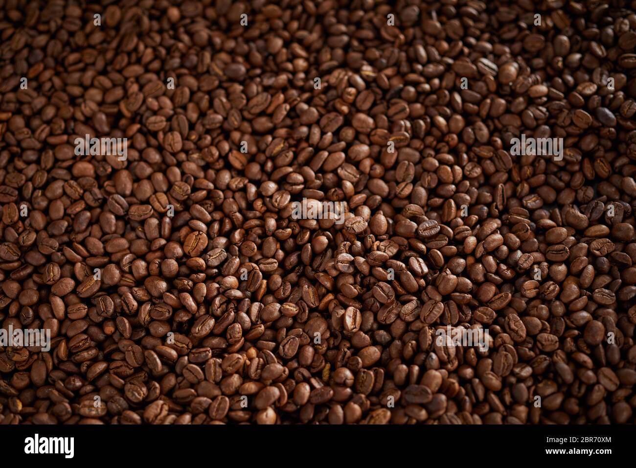 Full frame background texture of roasted coffee beans with side ...