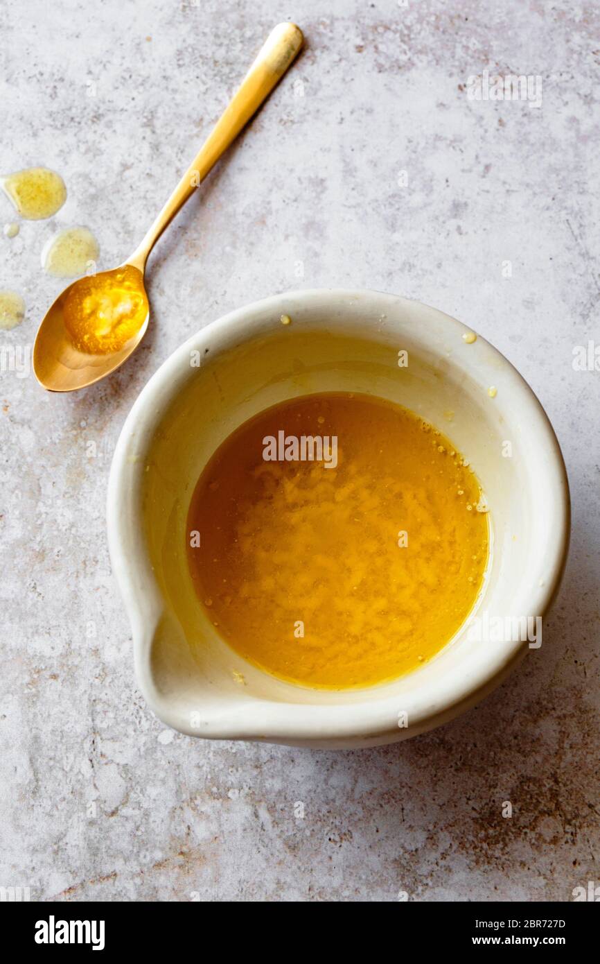 Melted butter in a bowl Stock Photo - Alamy