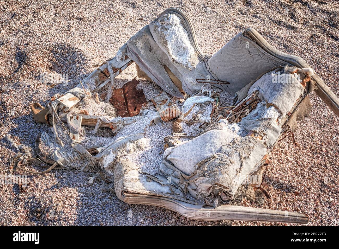 Old dilapidated chair on a beach. Salton Sea, California, USA Stock ...