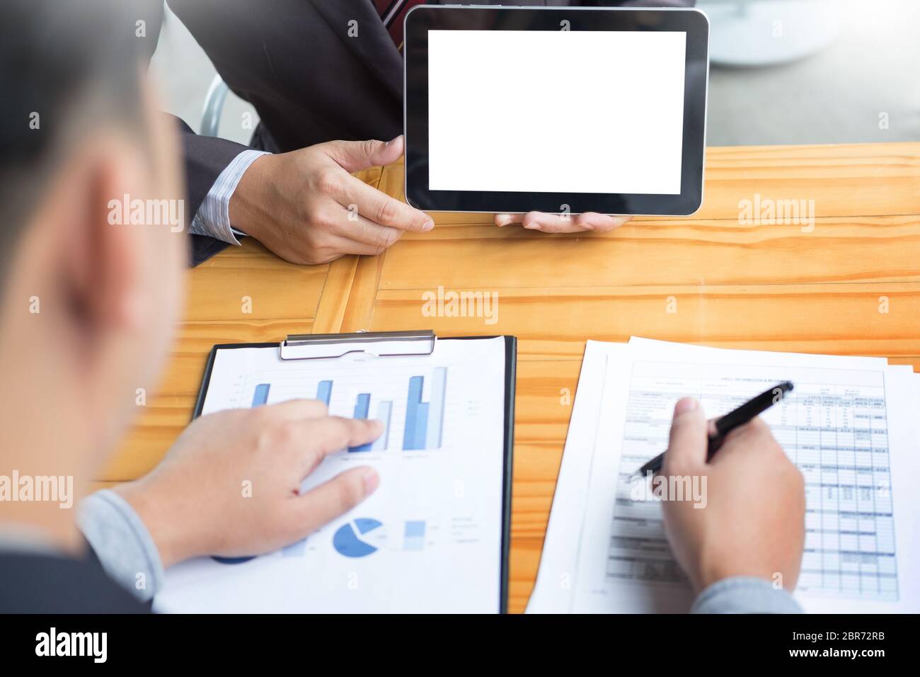 businessman presenting something at the seminar using tablet at the ...