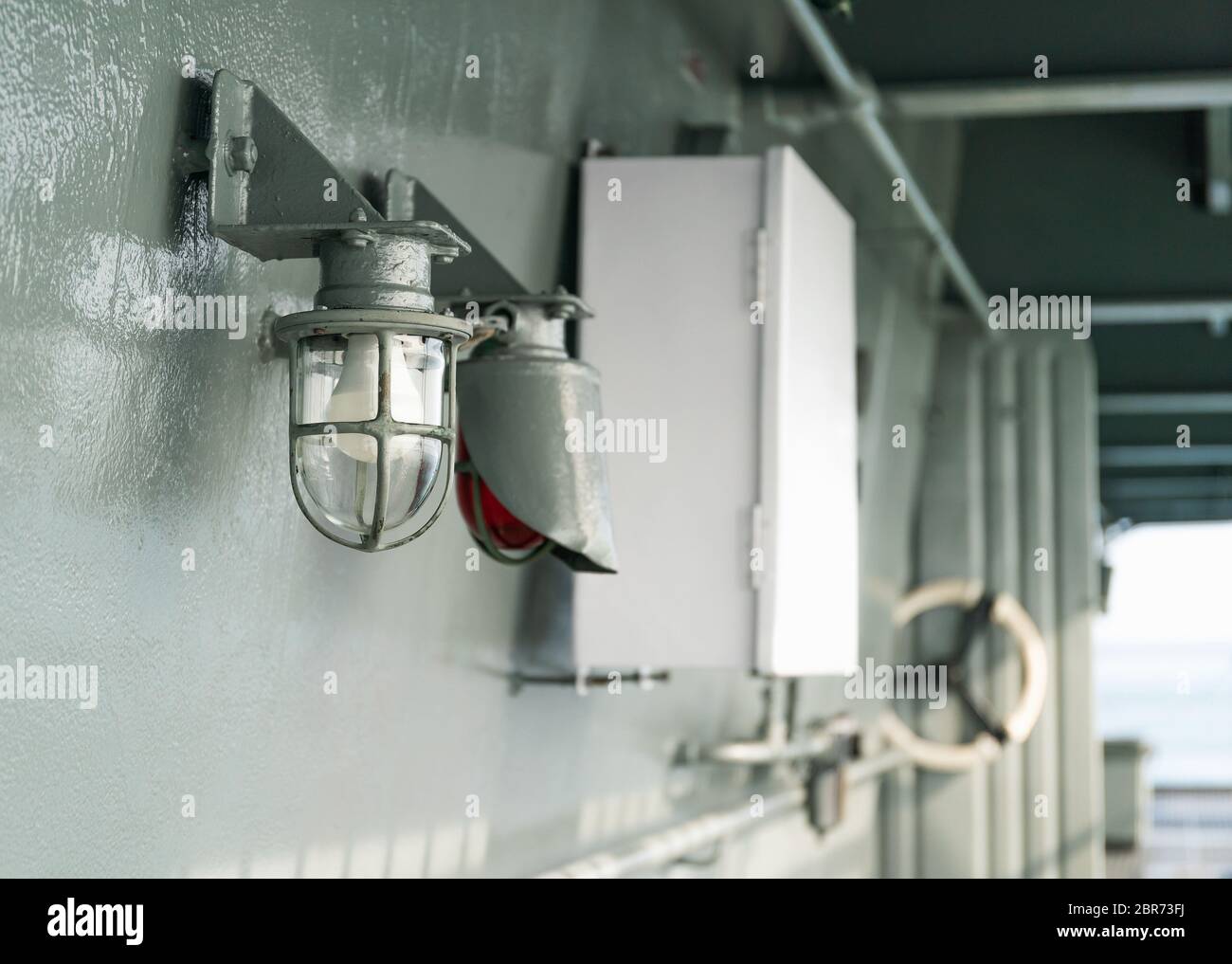 Deck lamp on ship with metal frame fixed in protective cage Stock Photo ...