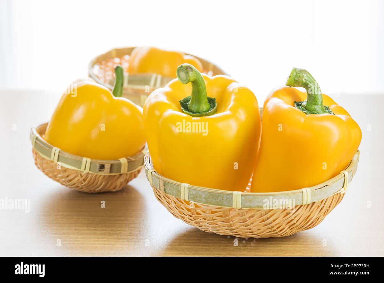 Capsicum in basket hi-res stock photography and images - Alamy