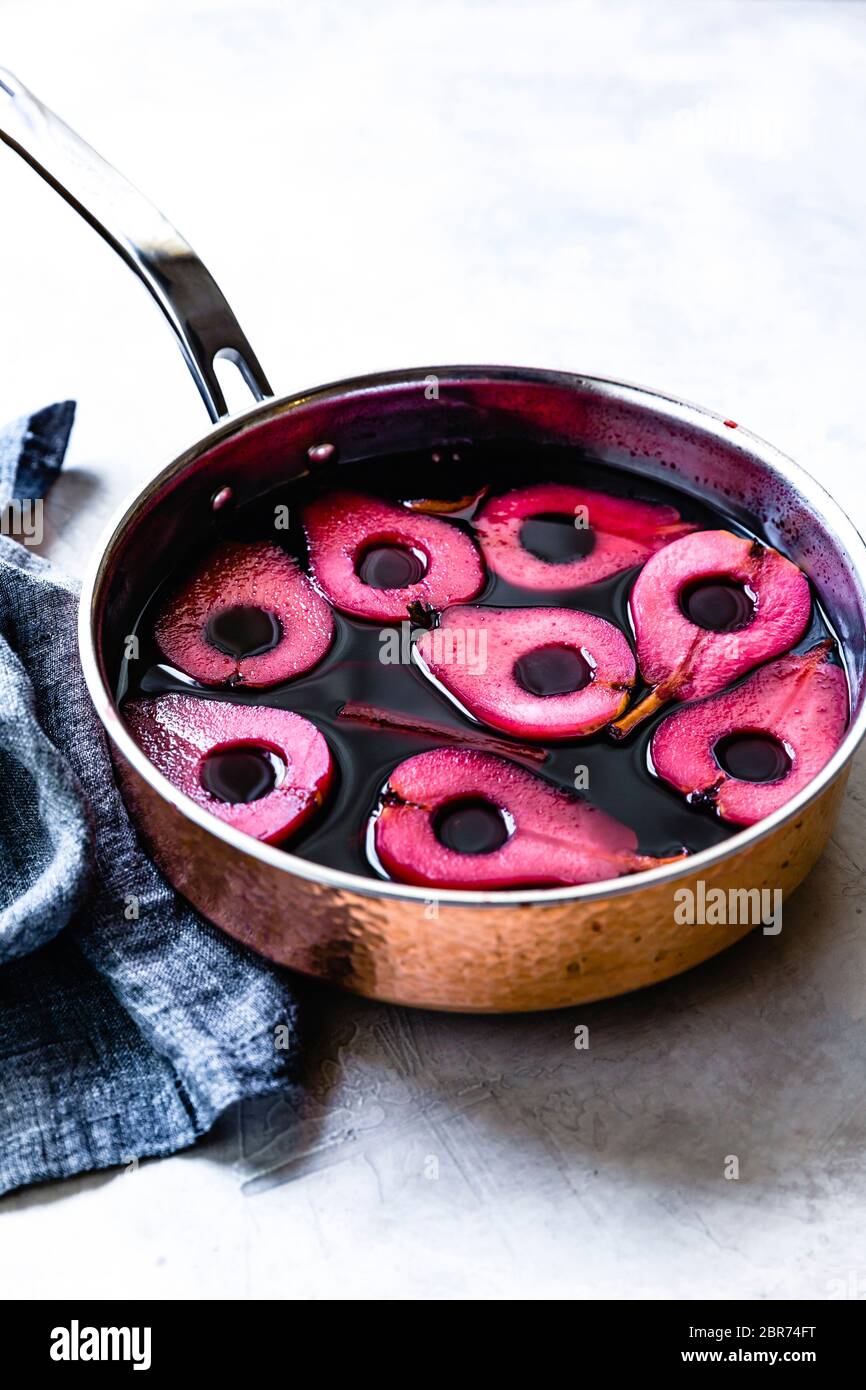 Halves poached pear hi-res stock photography and images - Alamy