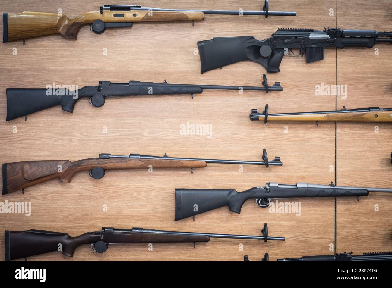 Hunting rifles on wall hi-res stock photography and images - Alamy