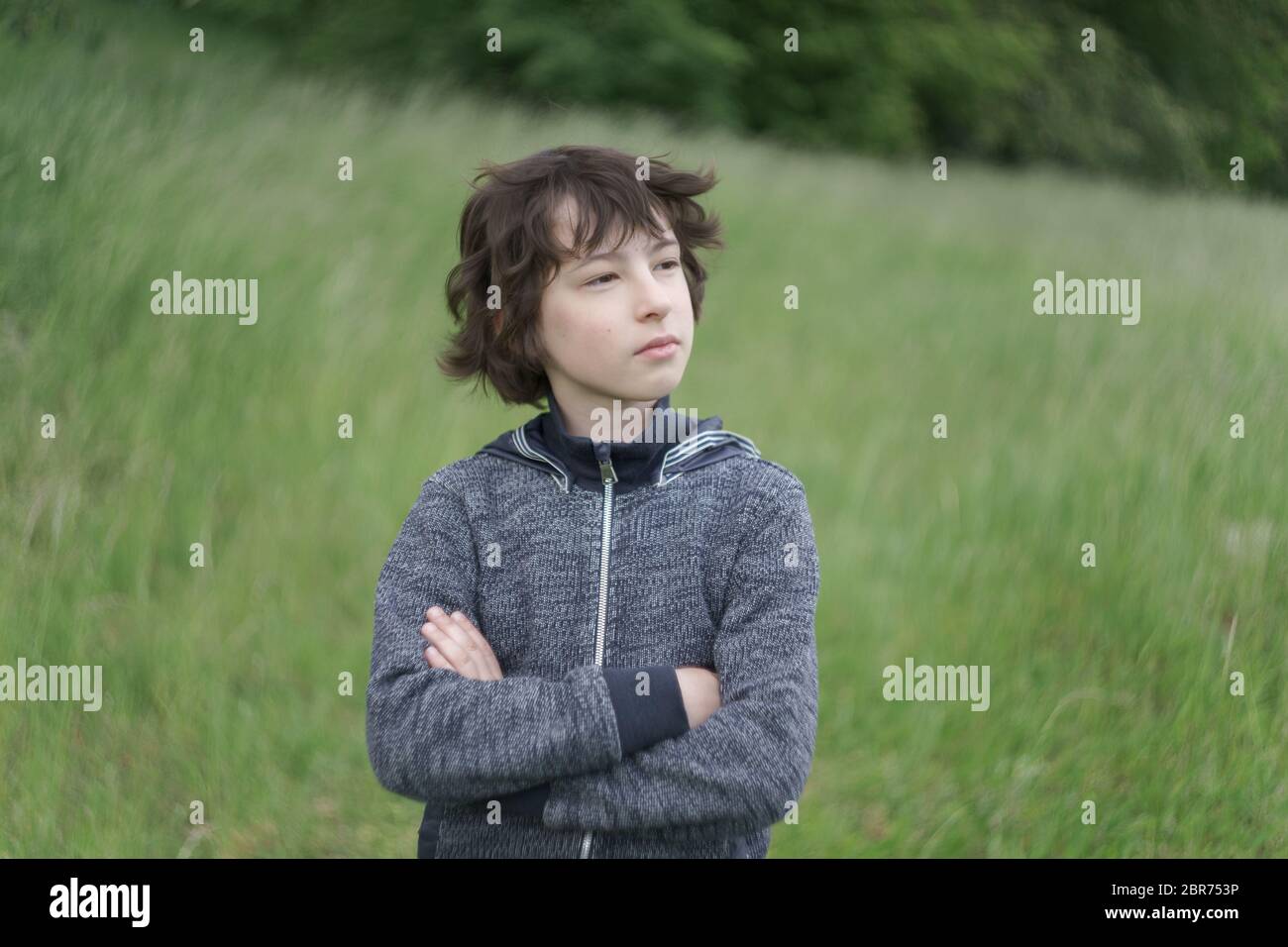 Portrait of a boy with a proud look Stock Photo - Alamy