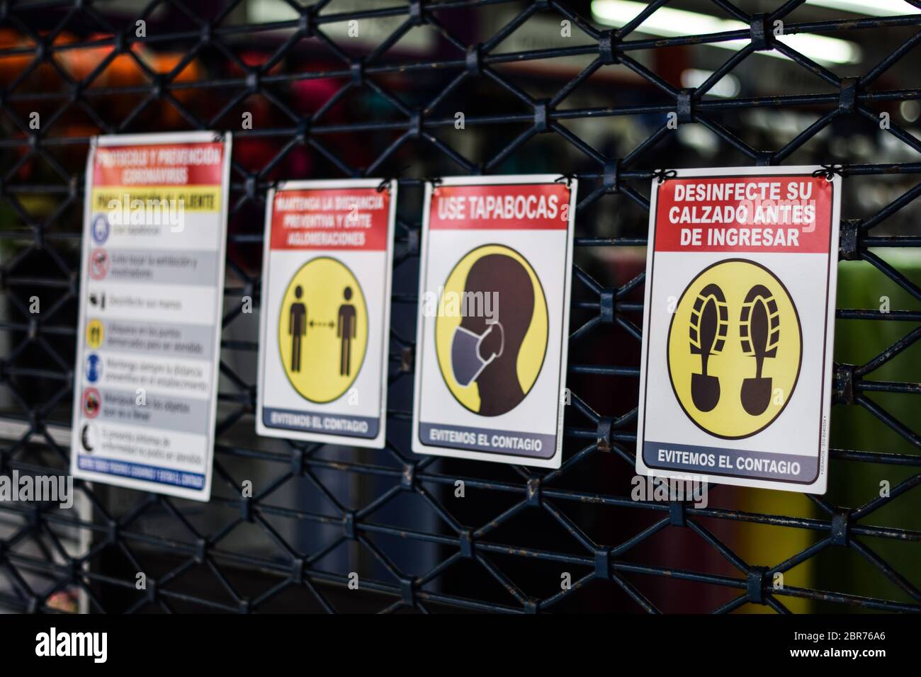 Safety and caution signs at shop entrance during Coronavirus outbreak ...